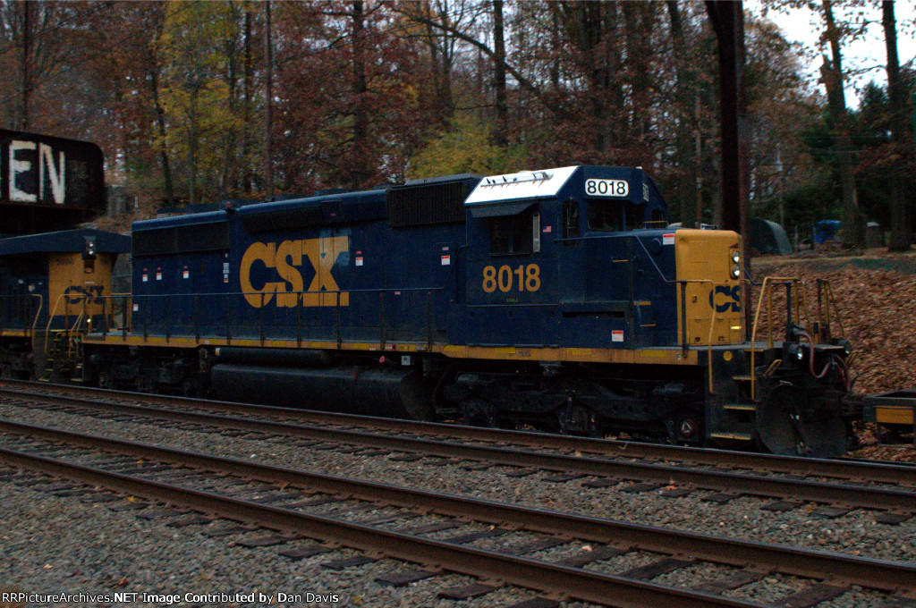 CSX SD40-2 8018 trails on Q702-12